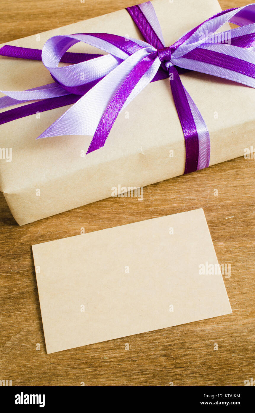 Present with Empty Tag on Wooden Background Stock Photo - Alamy