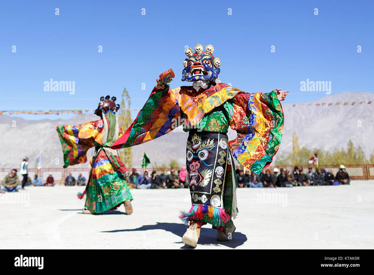 Buddhist monks performs masked dance at religious ceremony, Diskit ...