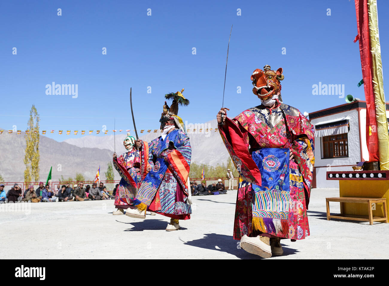 Buddhist monks performs masked dance at religious ceremony, Diskit ...