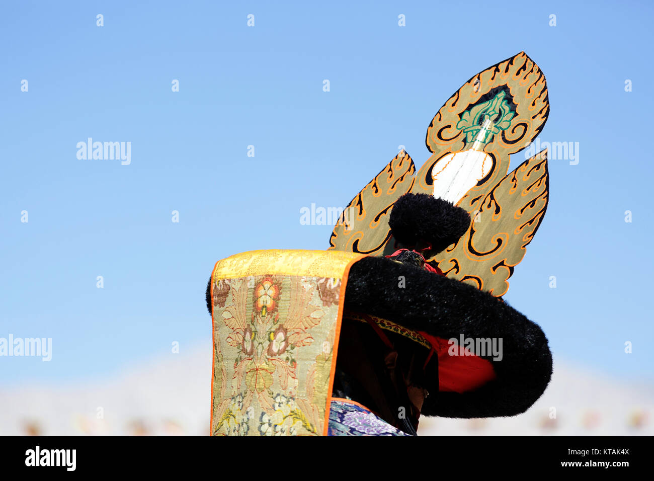 Buddhist monk wearing a beautiful headwear at masked dance at religious ...