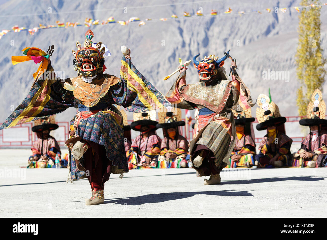 Buddhist monks performs masked dance at religious ceremony, Diskit ...