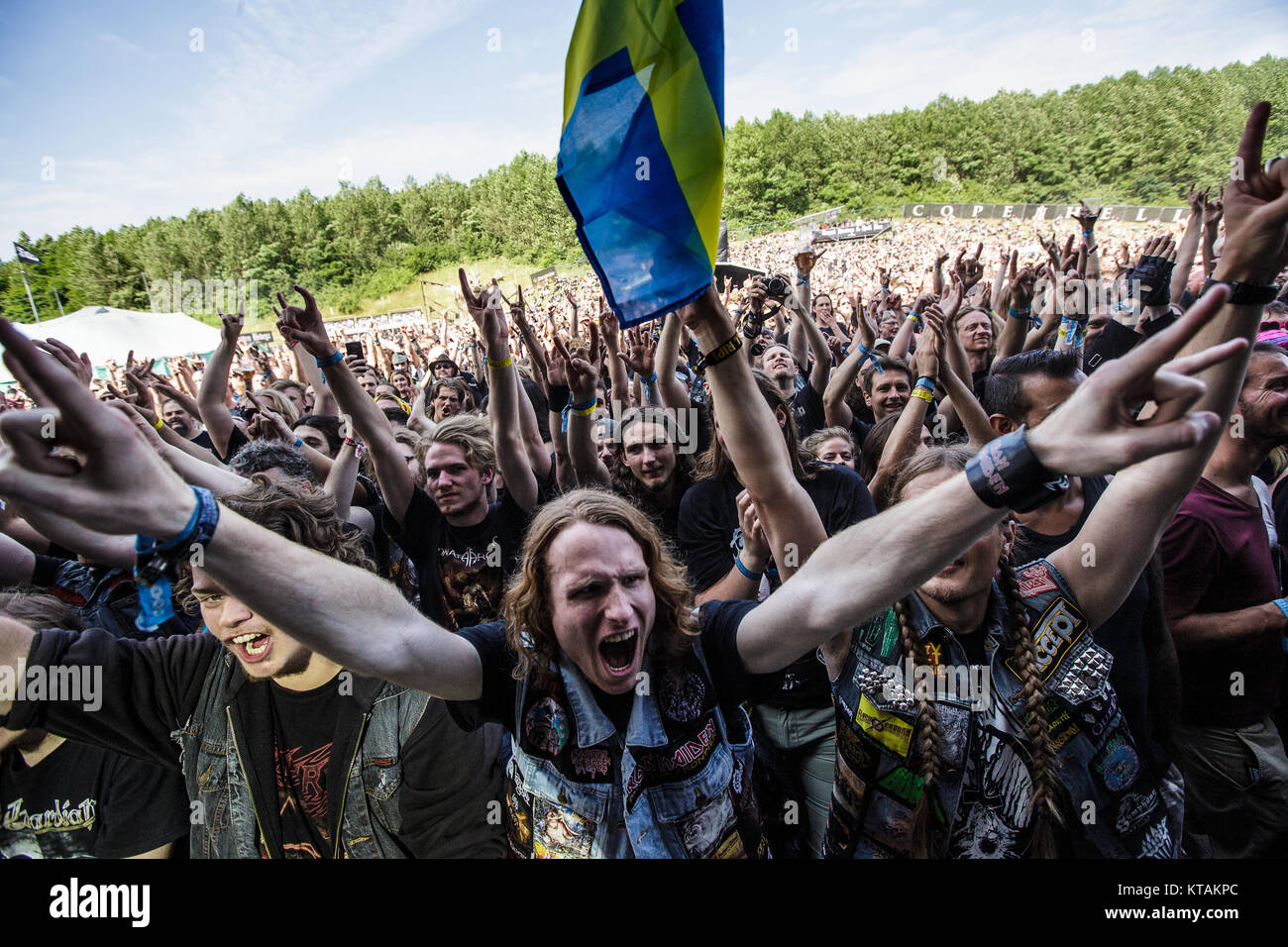 Enthusiastic heavy metal fans go crazy at the Scandinavian heavy metal ...