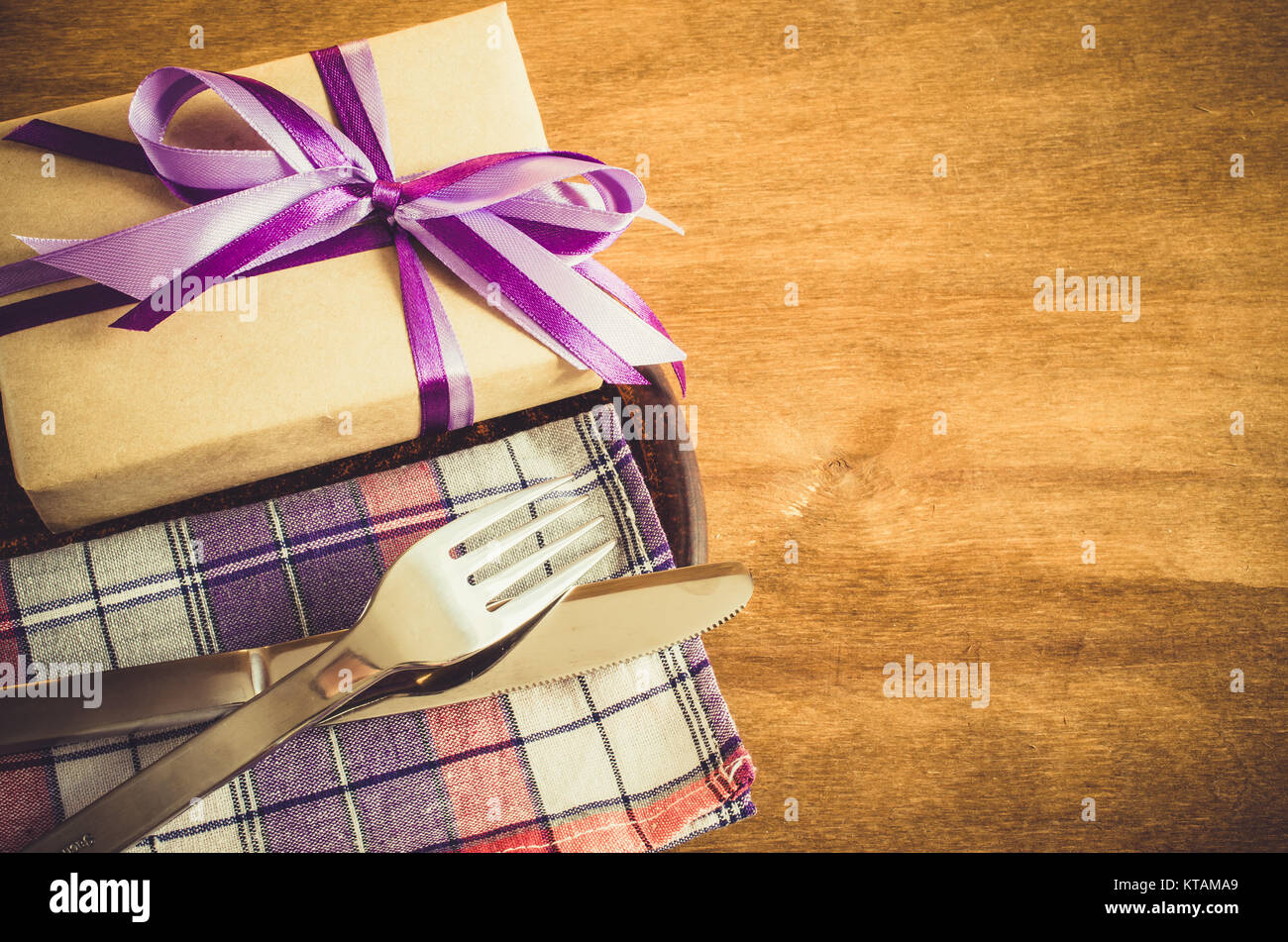 Festive Table Setting with Present Stock Photo - Alamy