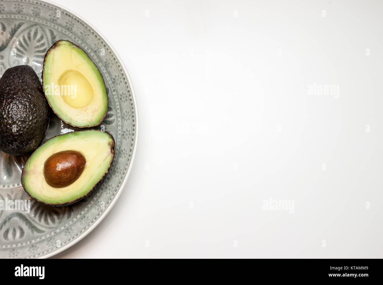 avocado in beautiful grey plate Stock Photo - Alamy