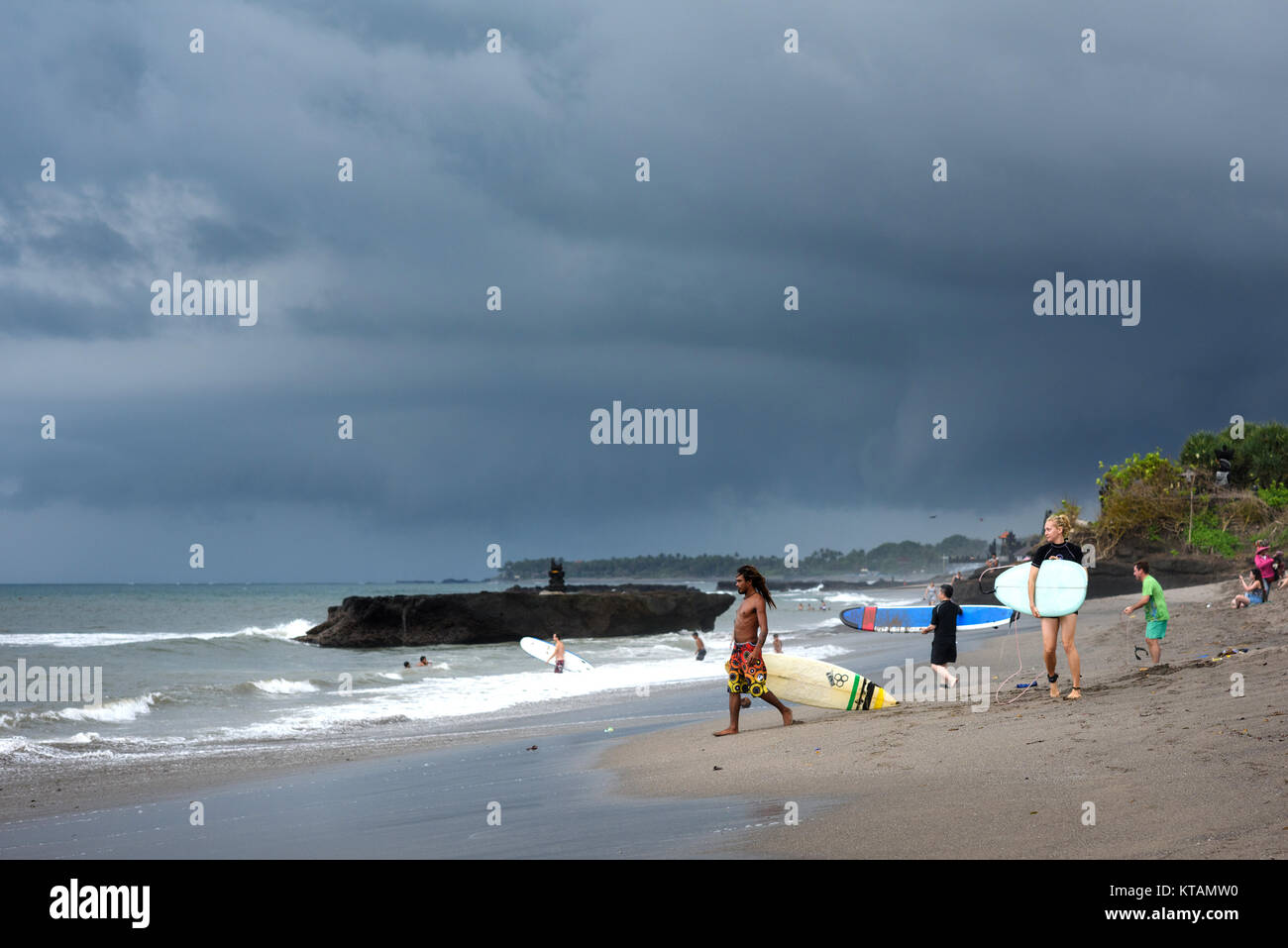 Travel destination, discover surfing paradise. Surfers with surfboards ...