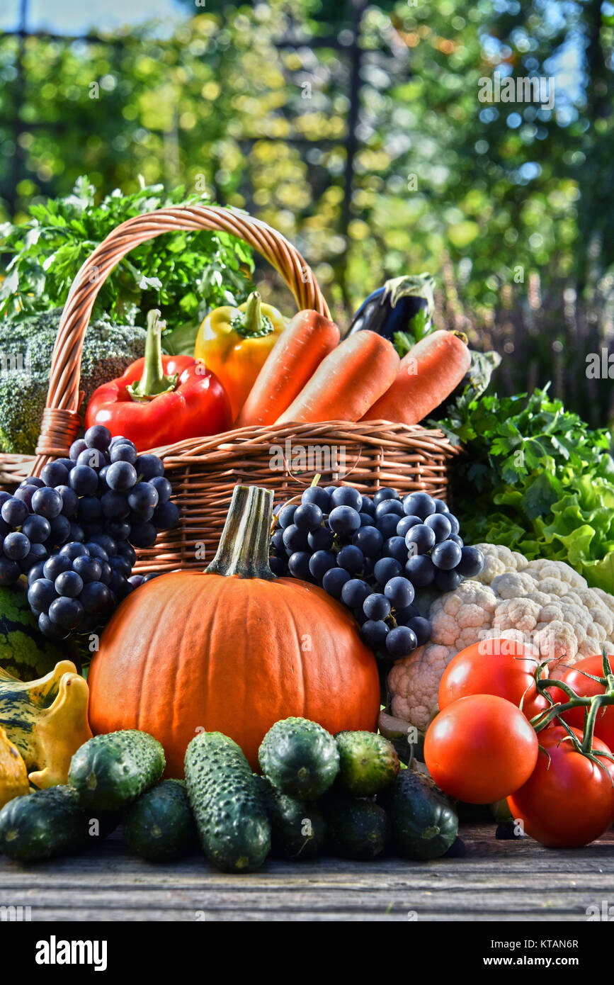 Variety of fresh organic vegetables and fruits in the garden Stock ...