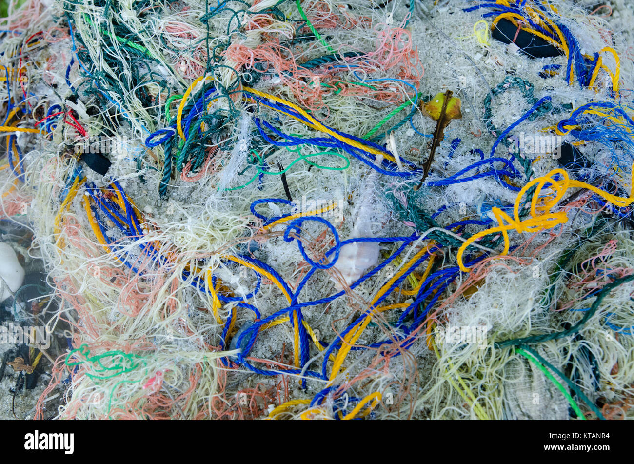 Background of color fishing net and cord on the heap Stock Photo - Alamy