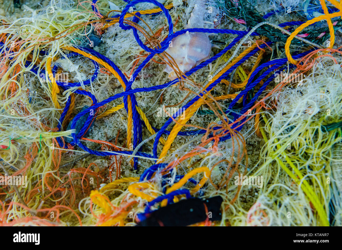 Background of color fishing net and cord on the heap Stock Photo - Alamy