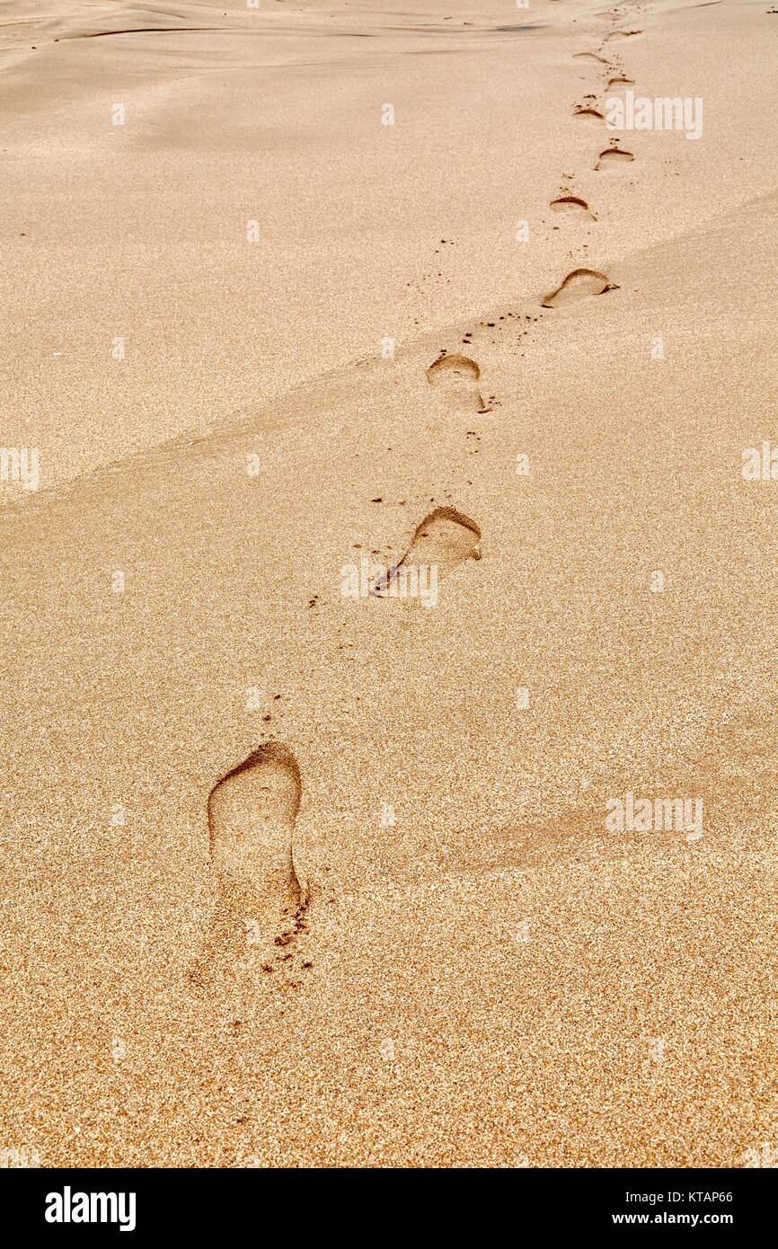 Footsteps in Sand Stock Photo - Alamy