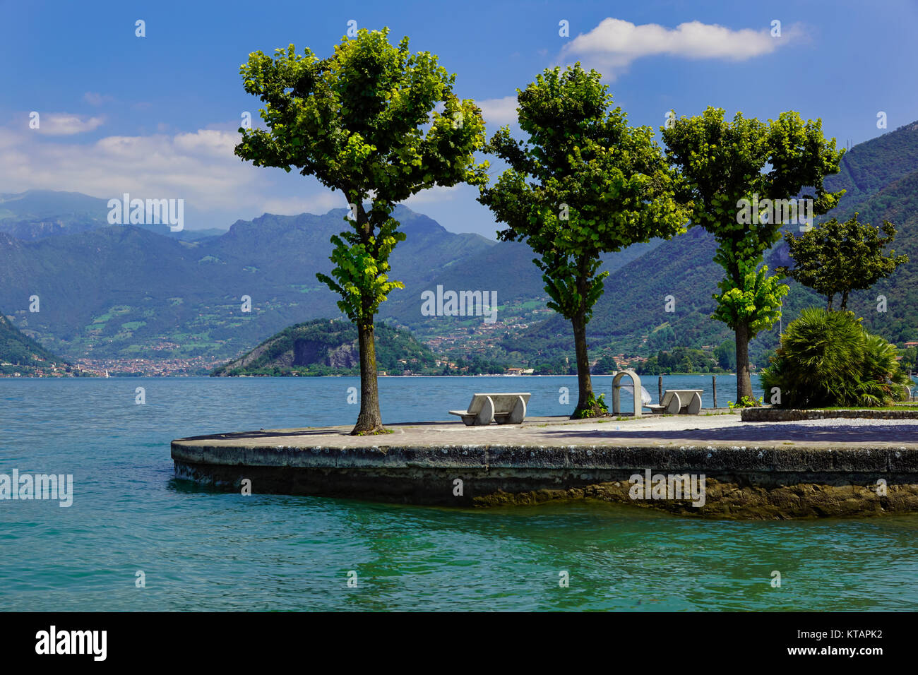 View of italy lake , with park, lake and mountain views Stock Photo - Alamy