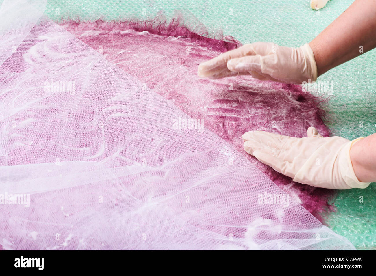 lathering the wool fibers on layout Stock Photo - Alamy