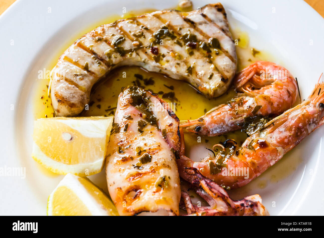 sicilian grilled fish and seafood mix close up Stock Photo - Alamy