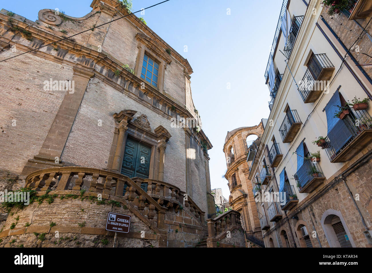 baroque style church and urban houses Stock Photo - Alamy