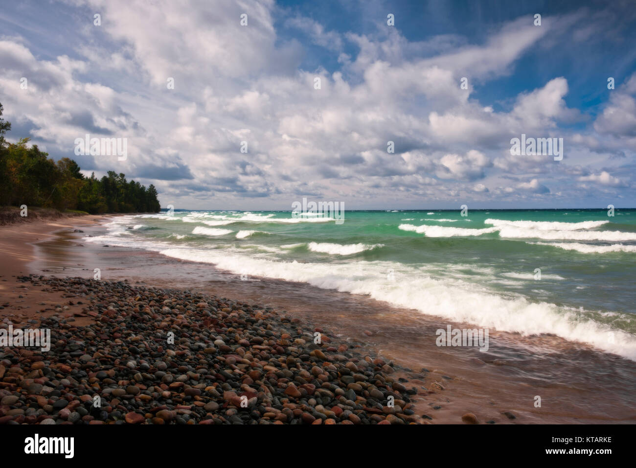 Autumn clouds and luminous colors of Lake Superior along Au Sable Point ...