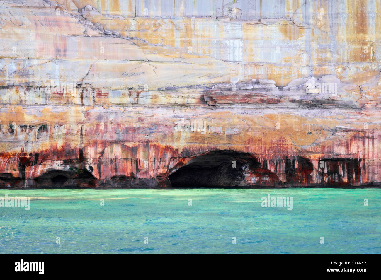 Mineral seep creates incredible colors in the sandstone cliffs on Lake ...