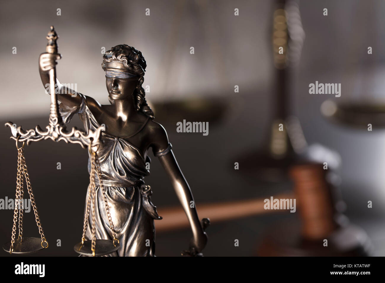Courtroom concept. Themis – symbol of blind justice. Gray stone ...