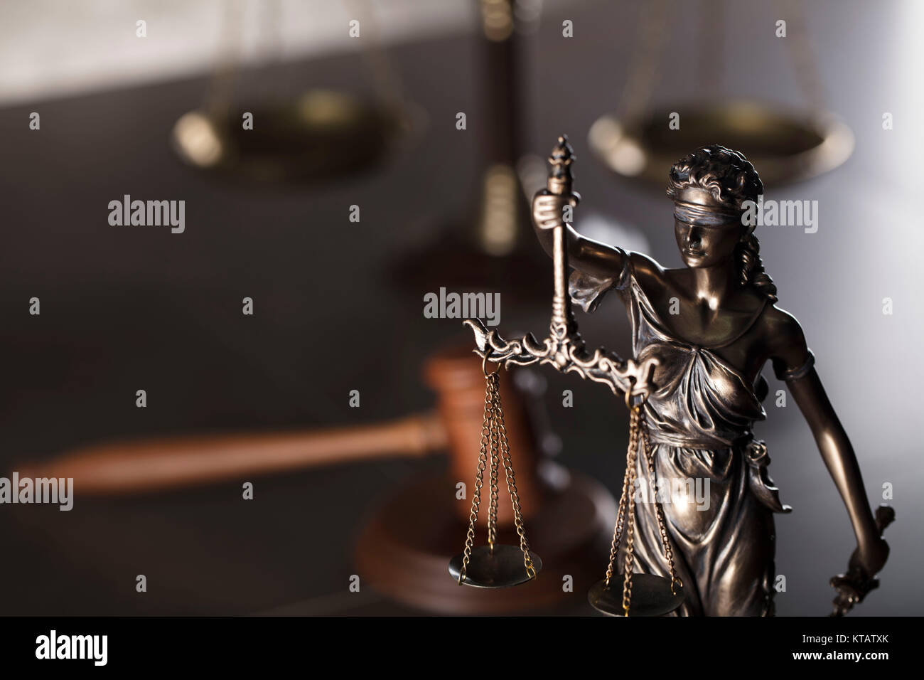 Courtroom concept. Themis – symbol of blind justice. Gray stone ...