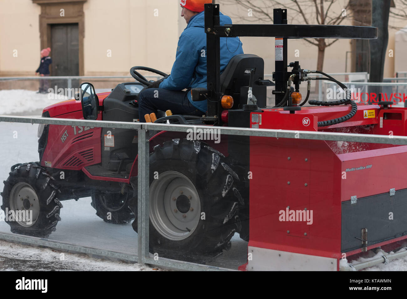 Brno,Czech Republic-December 18,2017: Man in tractor cleans artificial ...