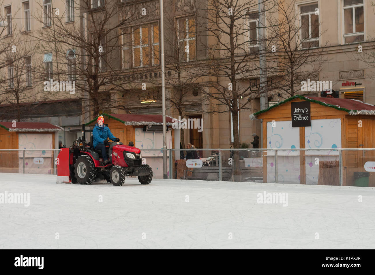 Brno,Czech Republic-December 18,2017: Man in tractor cleans artificial ...
