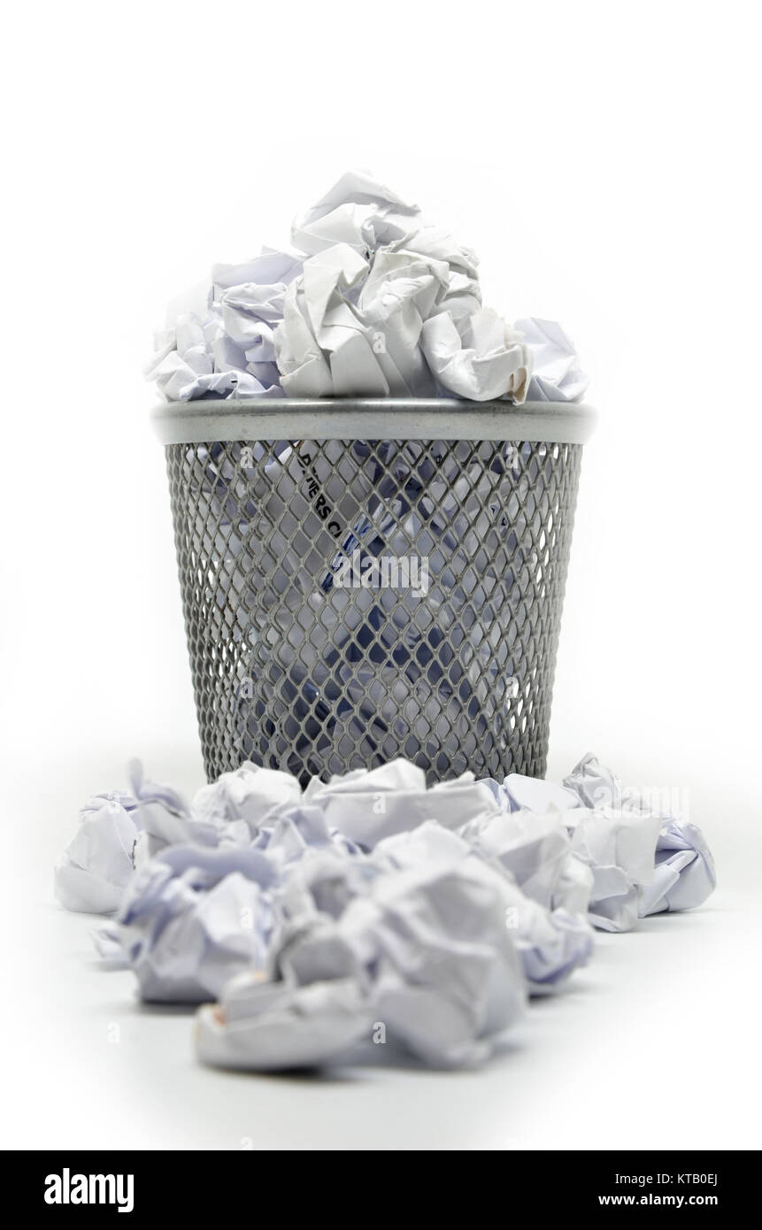 Garbage bin with paper waste Stock Photo - Alamy