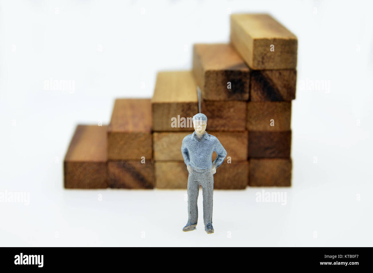 Way to success with businessman and wood block step Stock Photo - Alamy