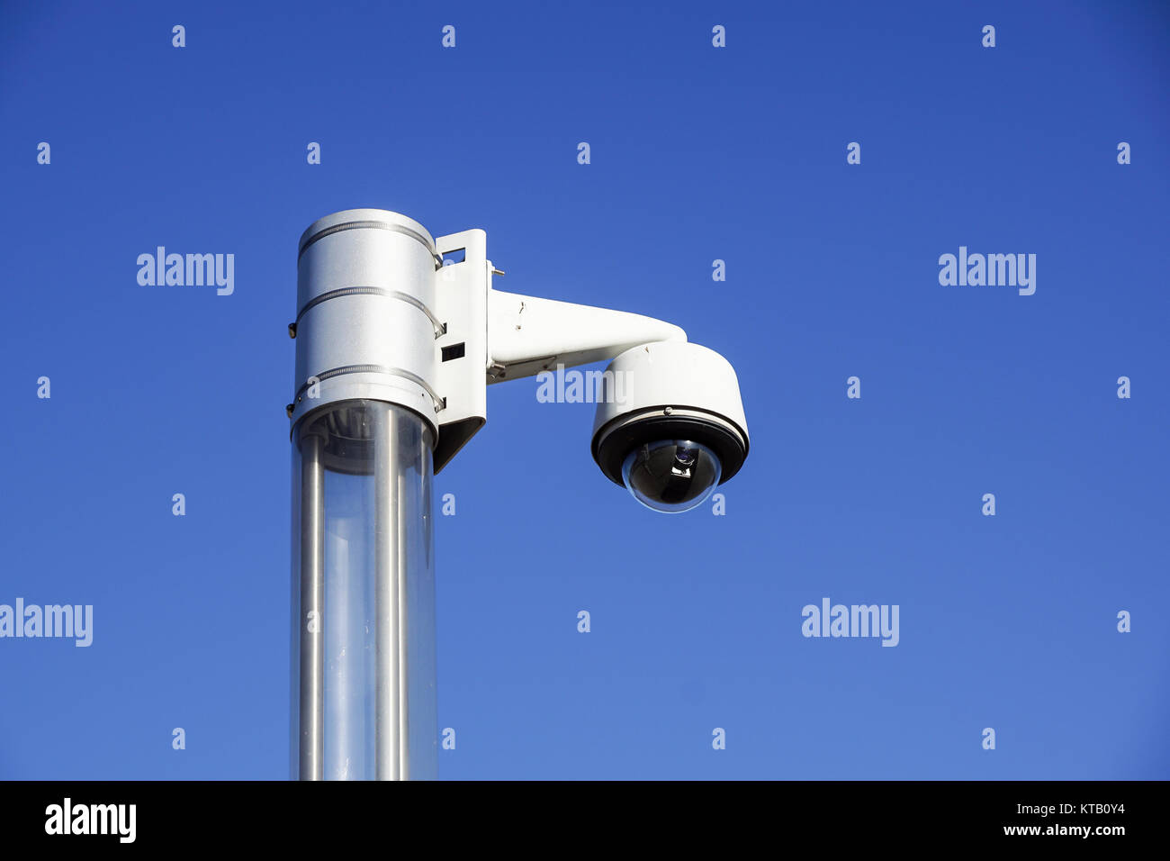 High tech overhead security camera with a blue sky Stock Photo - Alamy