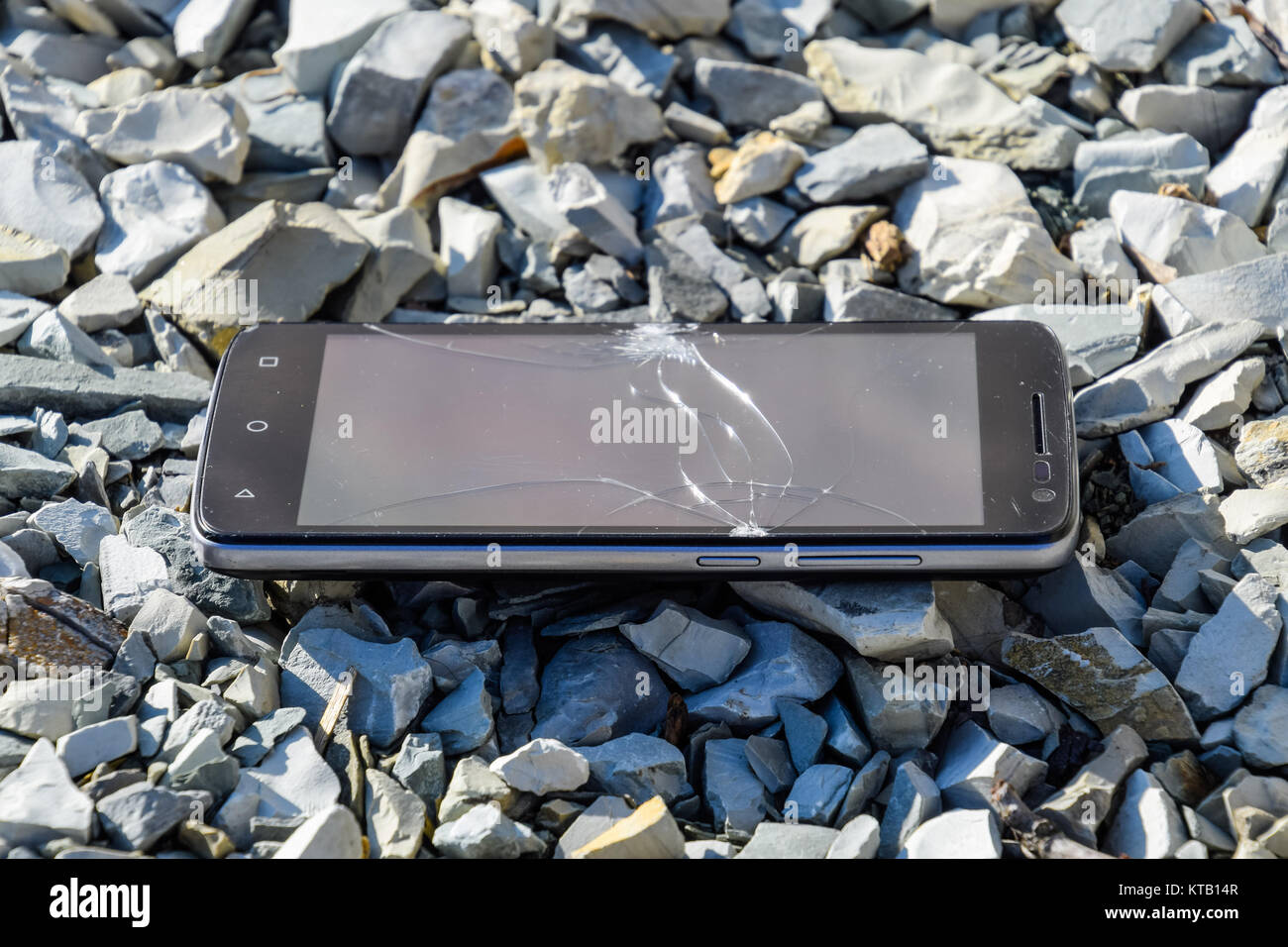 Frustrated phone on rocks hi-res stock photography and images - Alamy