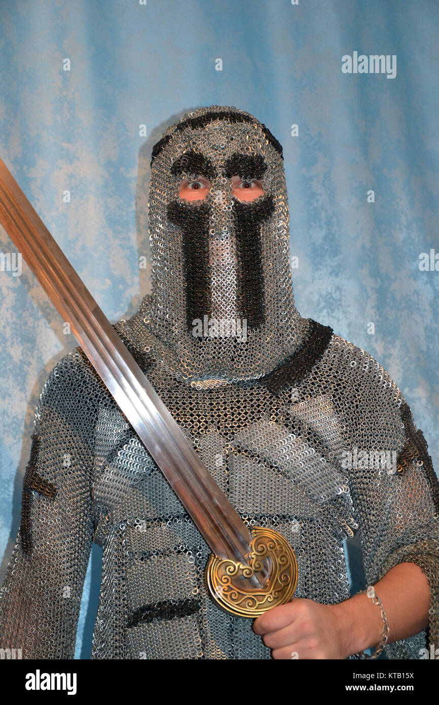 Knightly chain armor and sword Stock Photo - Alamy