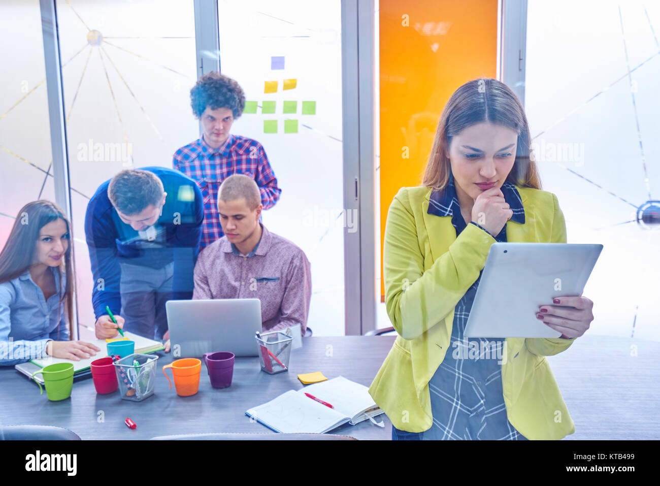 Portrait of startup group of creative people having a meeting with a ...
