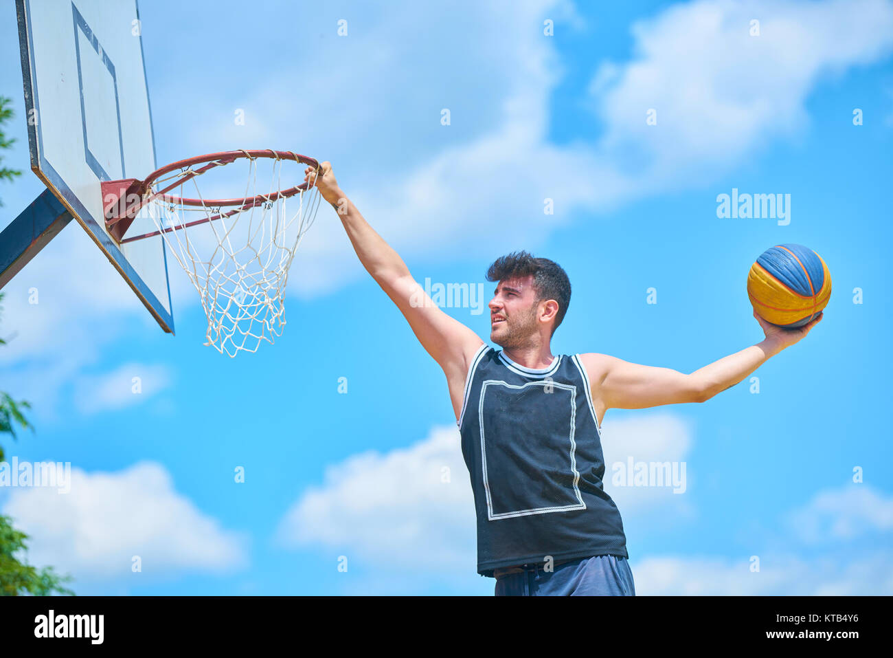 Young boys playing basketball Stock Photo - Alamy