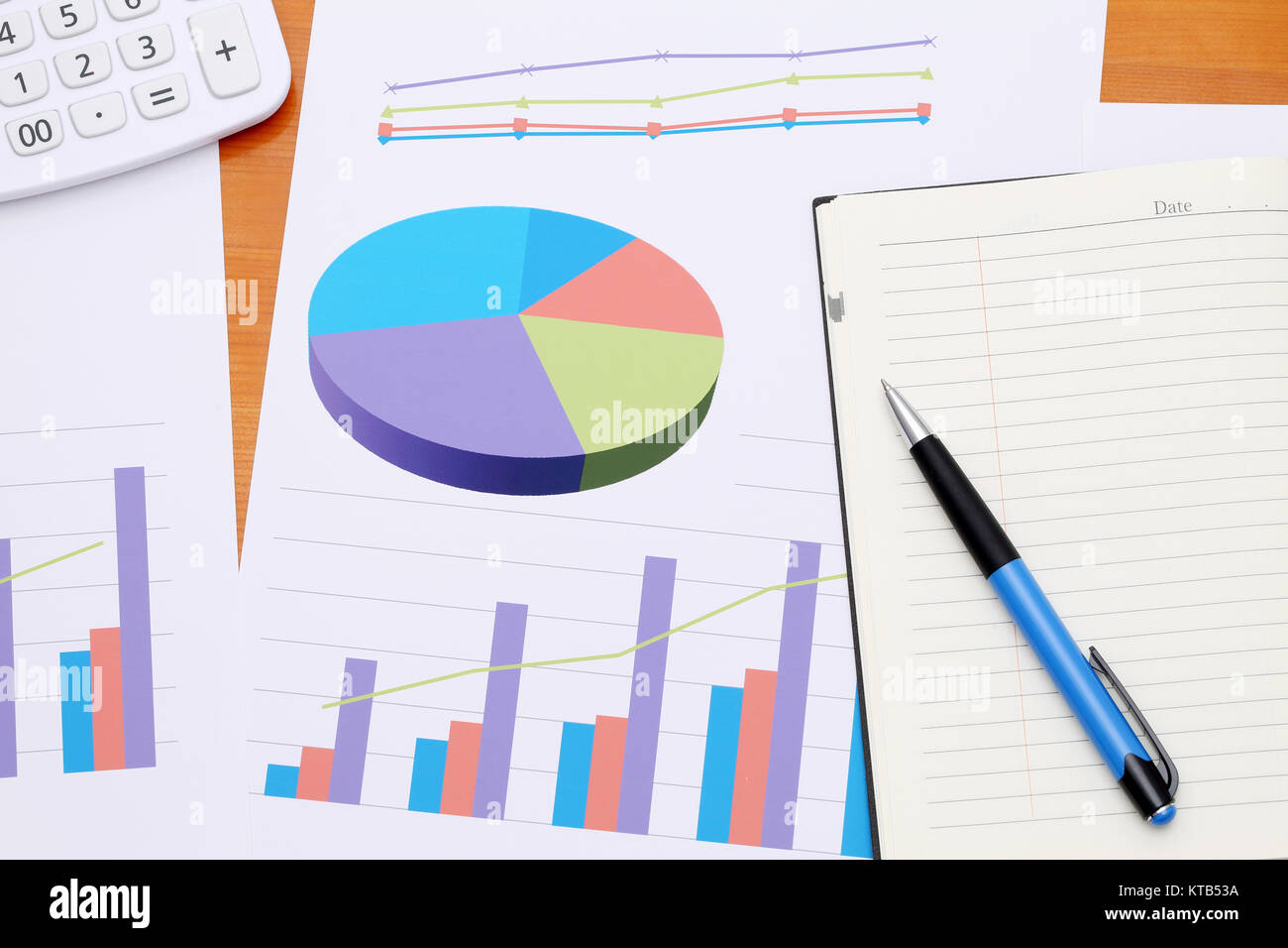 Color chart printed documents with pen and notebook Stock Photo - Alamy