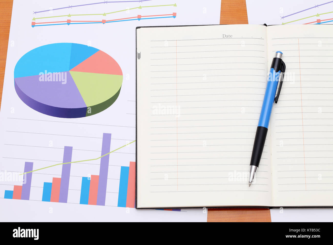 Color chart printed documents with pen and notebook Stock Photo - Alamy