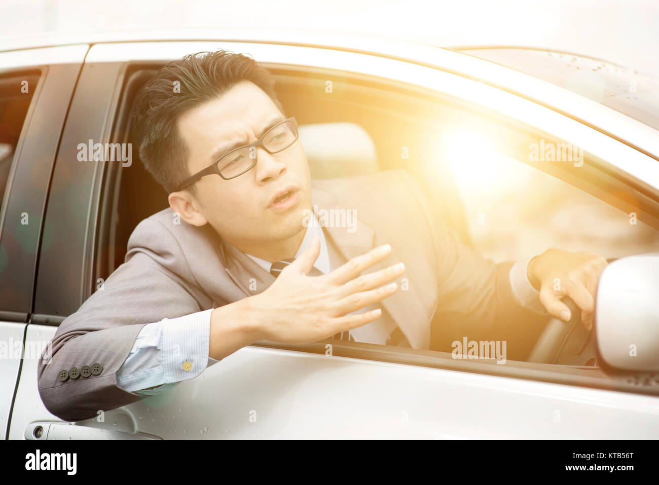 Angry Asian driver Stock Photo - Alamy