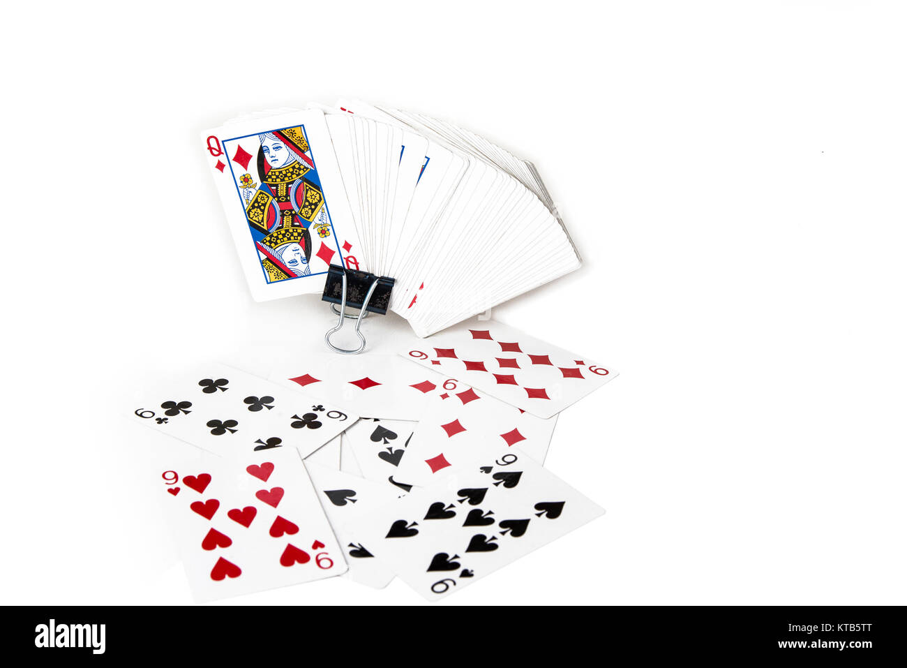 Playing cards spreaded on the white background Stock Photo - Alamy