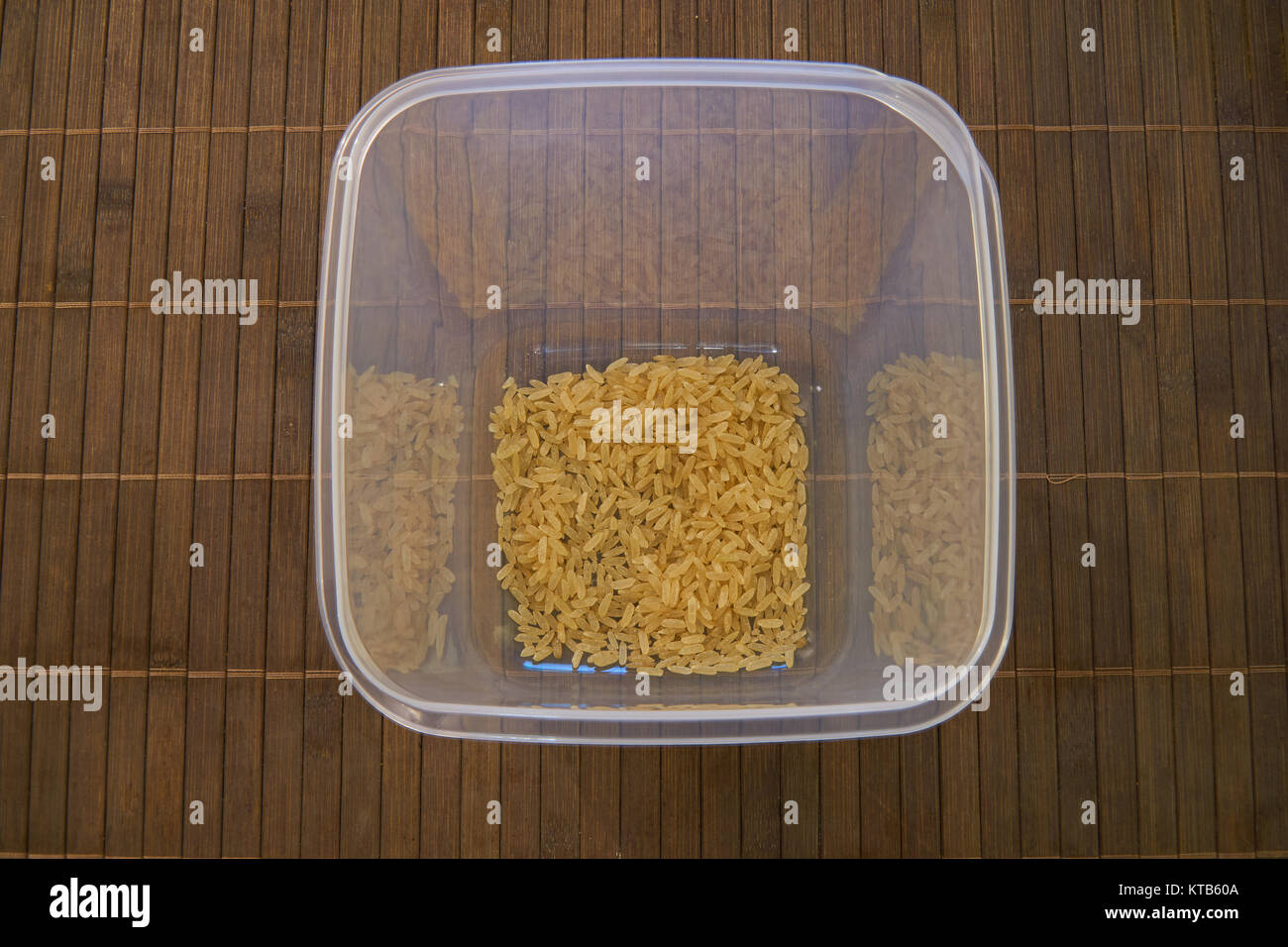 view in an empty storage container on the kitchen table Stock Photo - Alamy