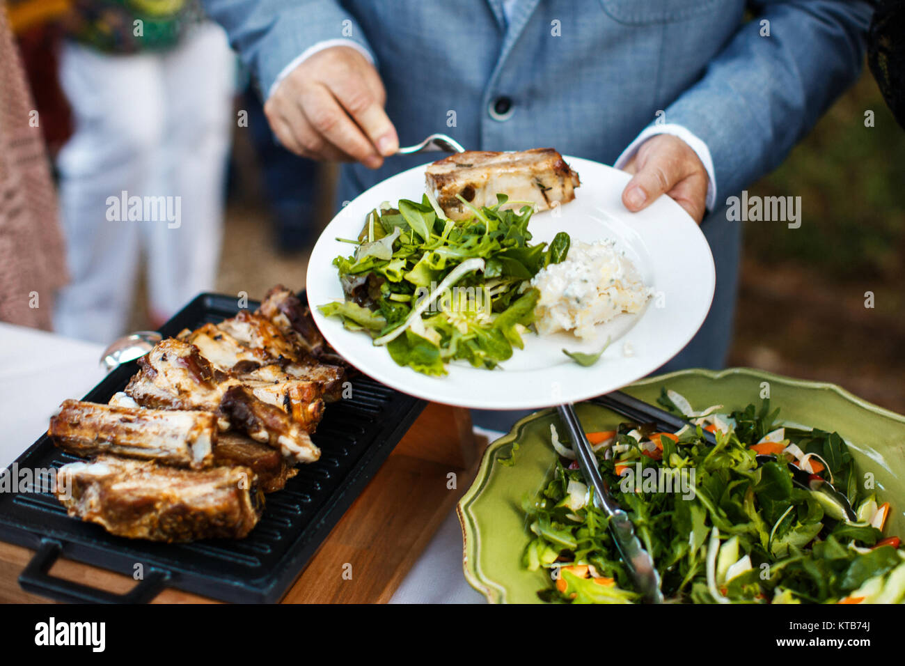 Street food at the wedding or another catered event dinner Stock Photo ...