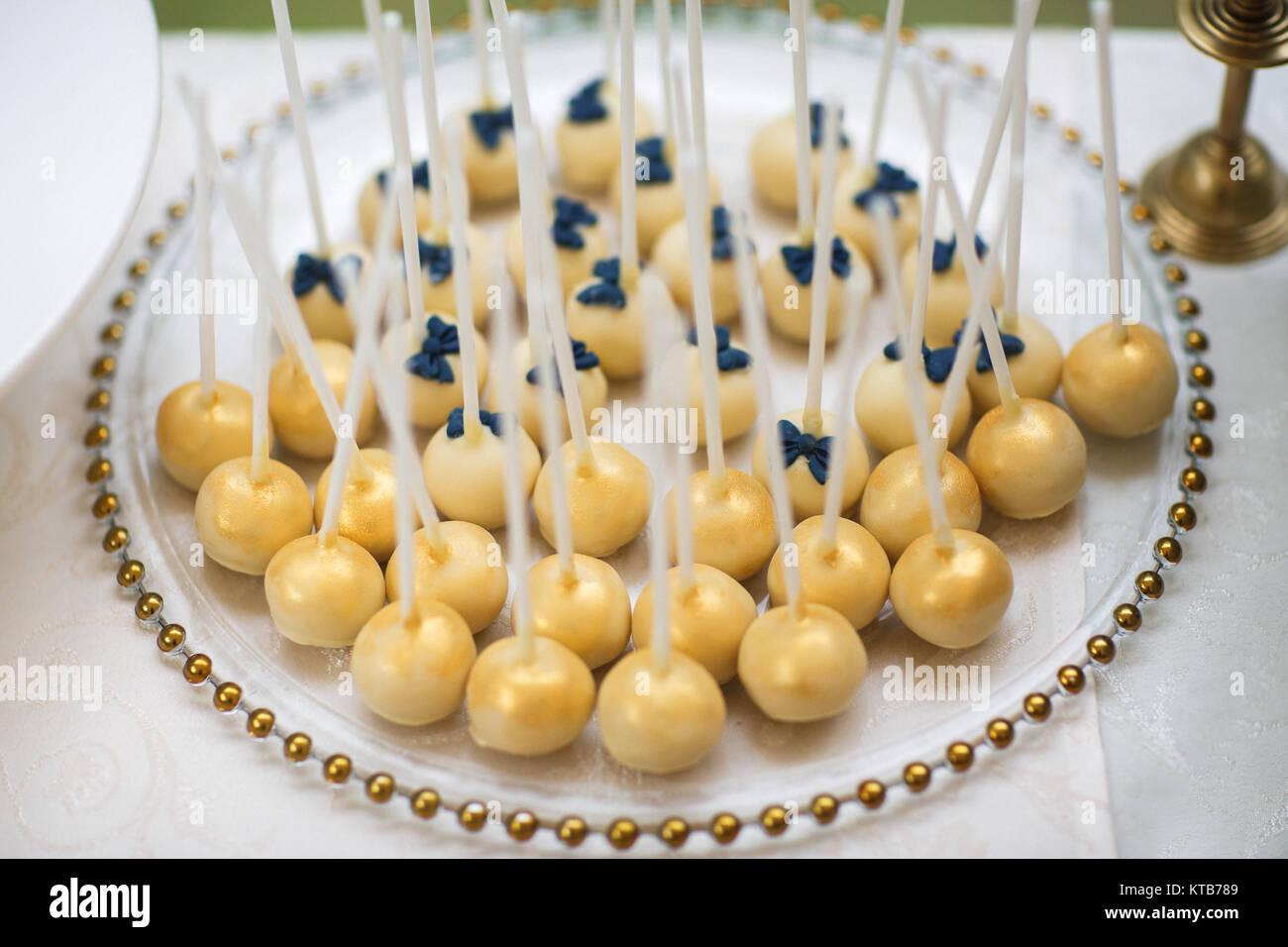 Round beautiful lollipop on candy bar table Stock Photo - Alamy