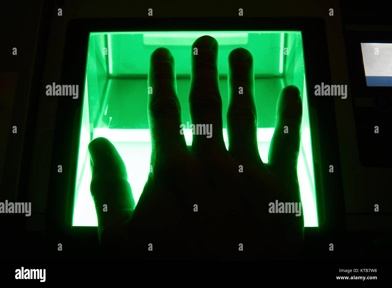 green cybersecurity digital fingerprint scanning on a green screen ...