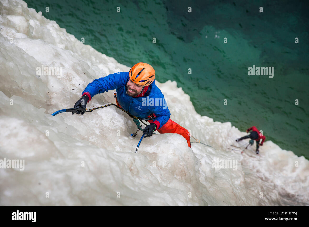 An ice climber in Northern Michigan, climbing at Pictured Rocks ...