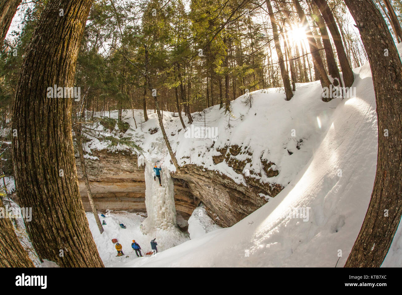 An ice climber in Northern Michigan, climbing at Pictured Rocks ...