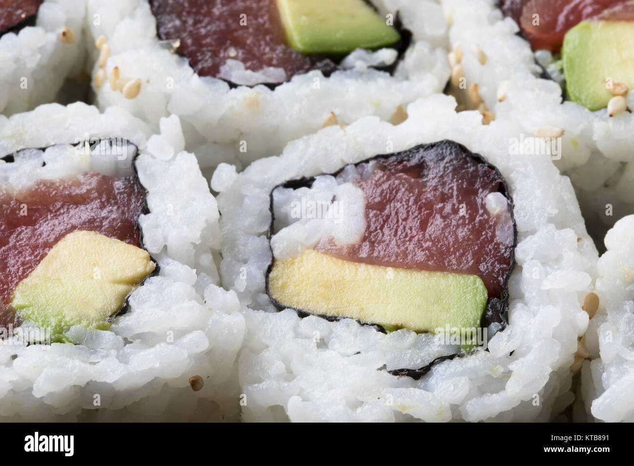 Tuna and Avocado Sushi Rolls Stock Photo - Alamy