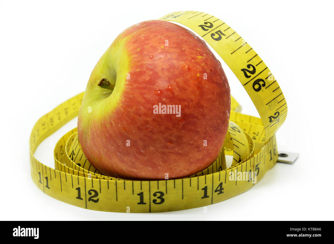 Apple and measuring tape Stock Photo - Alamy