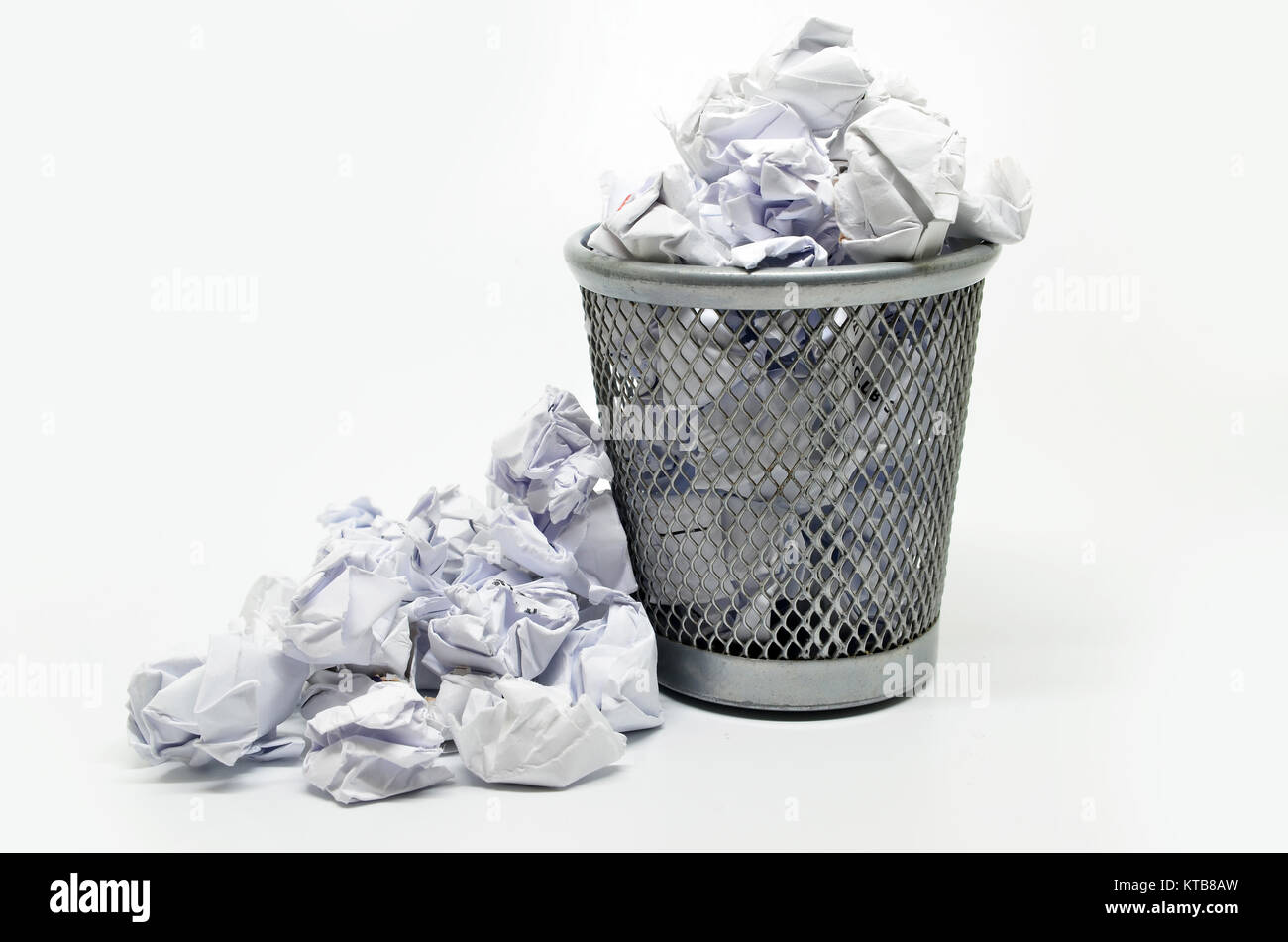 Garbage bin with paper waste Stock Photo - Alamy