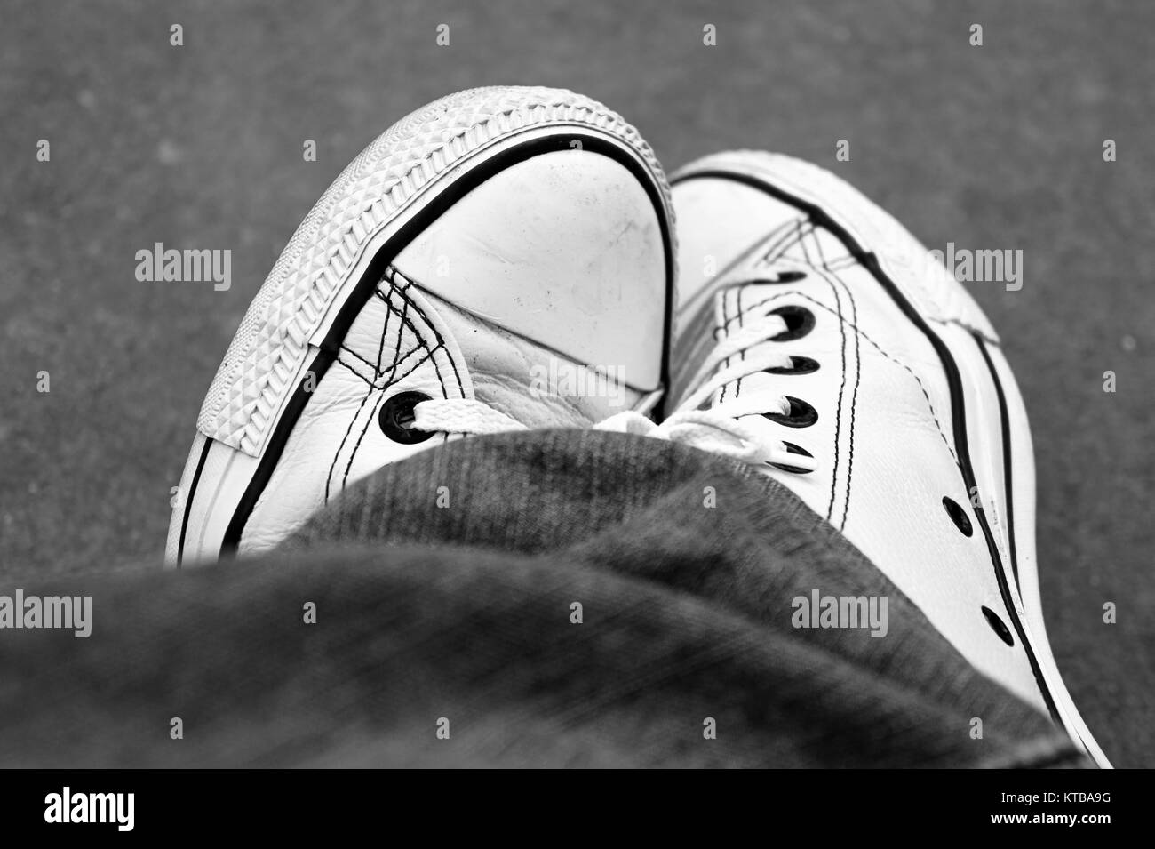 Converse legs Black and White Stock Photos & Images - Alamy