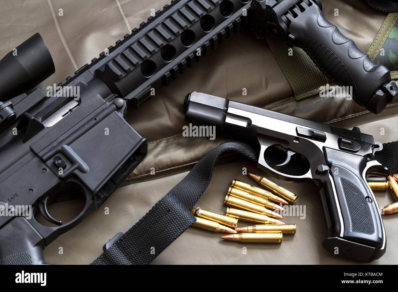 Guns with ammunition Stock Photo - Alamy