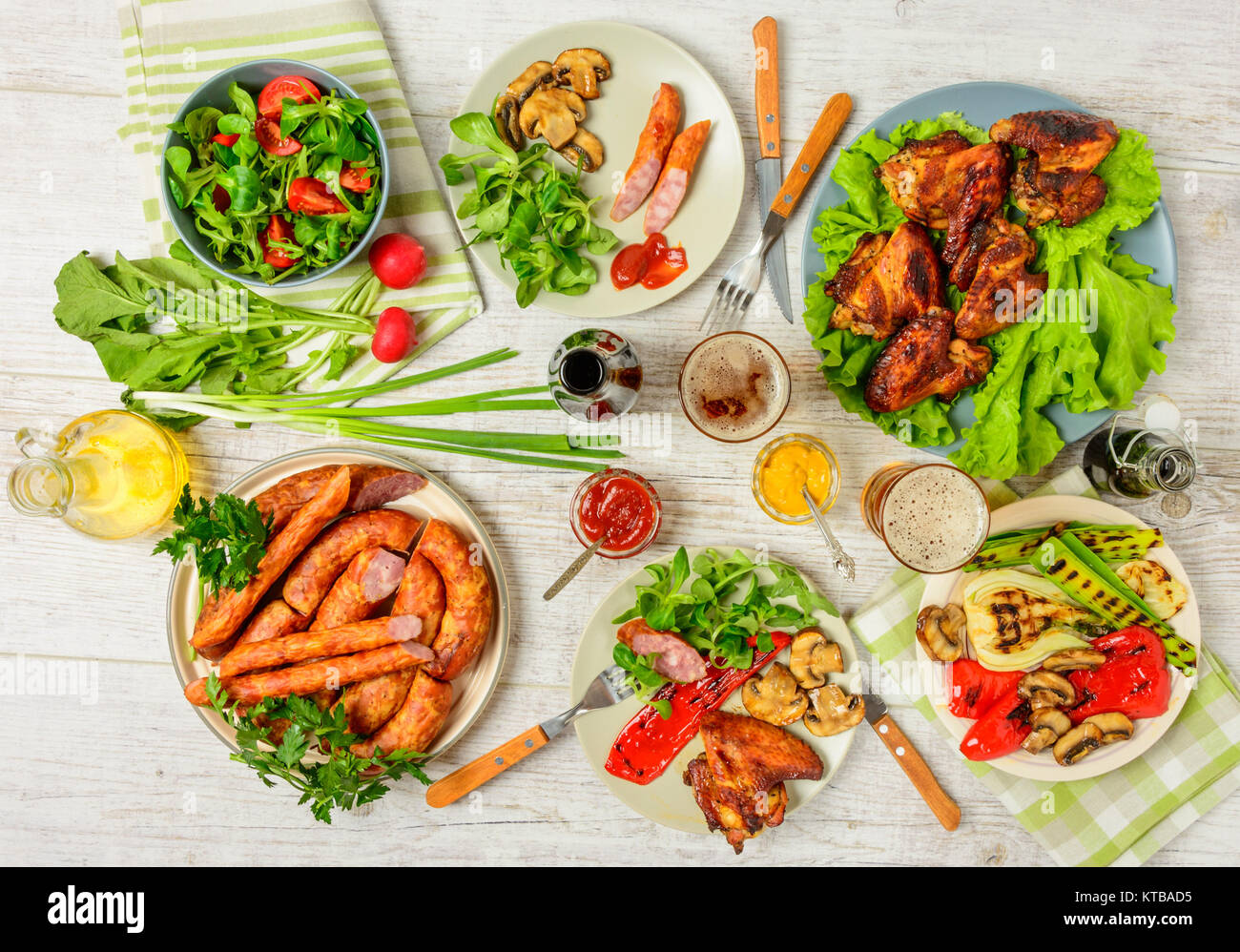Dinner table with variety food Stock Photo - Alamy