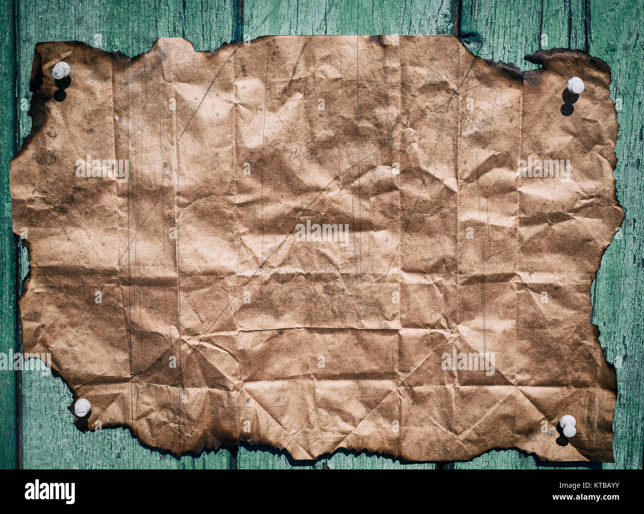 Burnt brown crumpled sheet of paper Stock Photo - Alamy