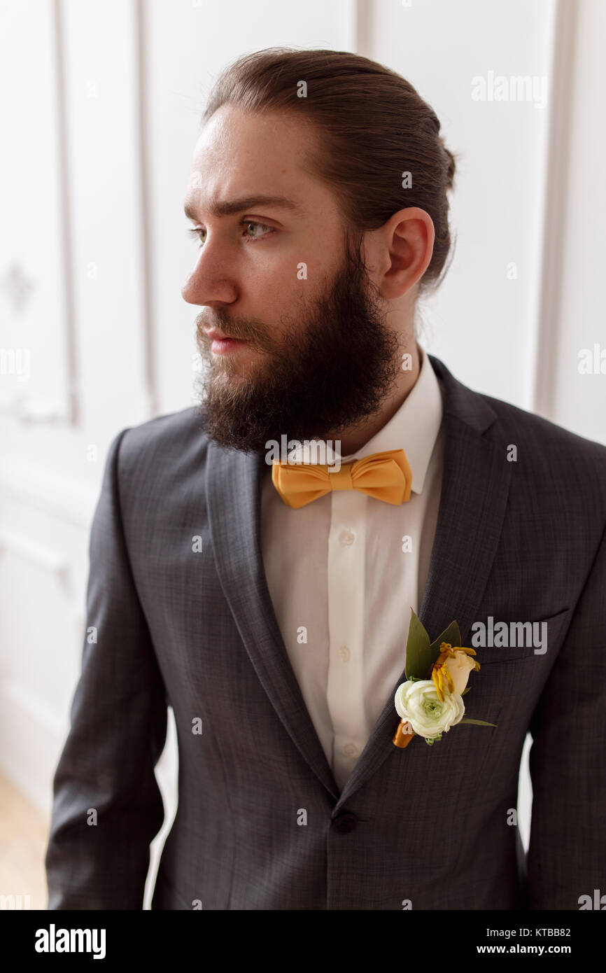 Bearded man in grey suit male hi-res stock photography and images - Alamy
