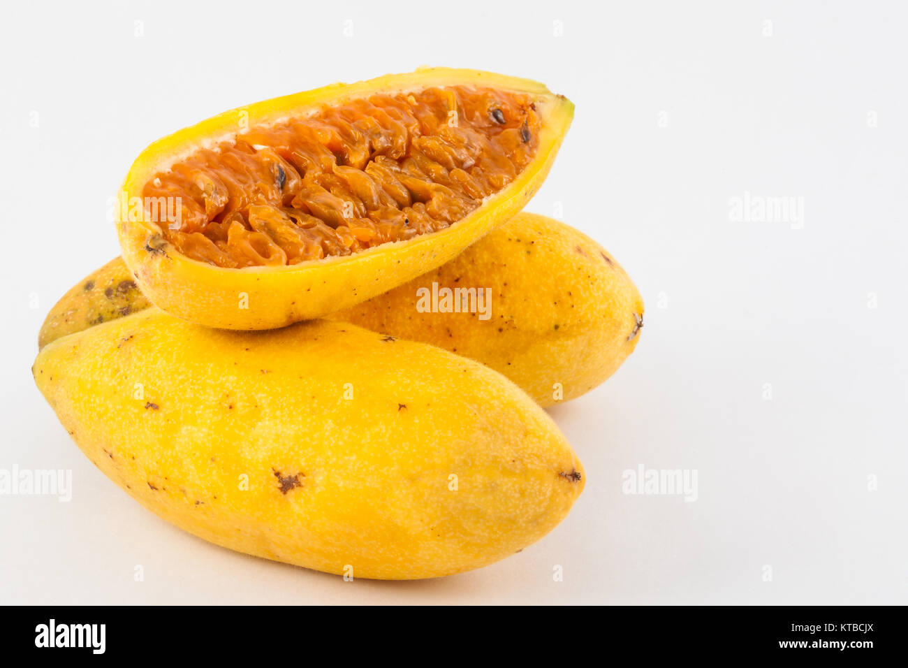 Exotic tropical fruit called curuba (Passiflora tripartita) on white ...