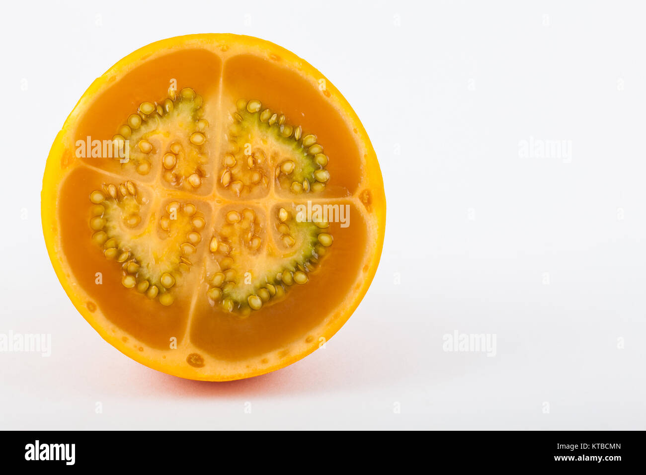 Lulo (Solanum quitoense) on white background Stock Photo - Alamy